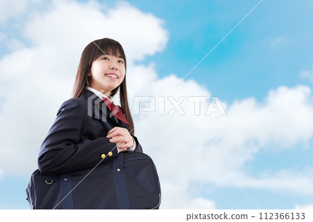 Female students commuting to school under the... - Stock Photo ...