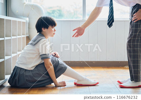 A high school boy reaching out to a depressed... - Stock Photo ...