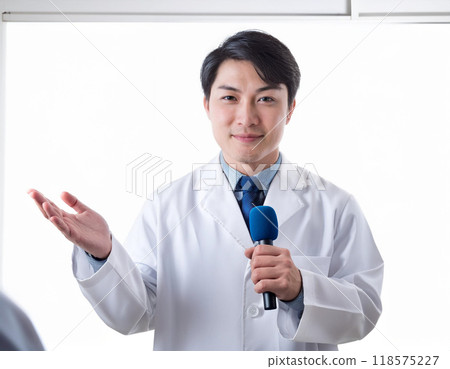 A Japanese man in a white coat being... - Stock Illustration [118575227 ...