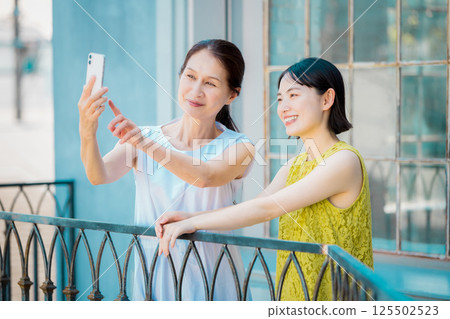 Mother and daughter girls trip resort tourism... - Stock Photo ...