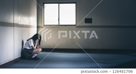 A female student crouching in the corner of a room - Stock Illustration ...