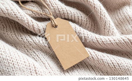 Blank Beige Cardboard Tag on Cozy Knitted Cloth... - Stock Illustration ...